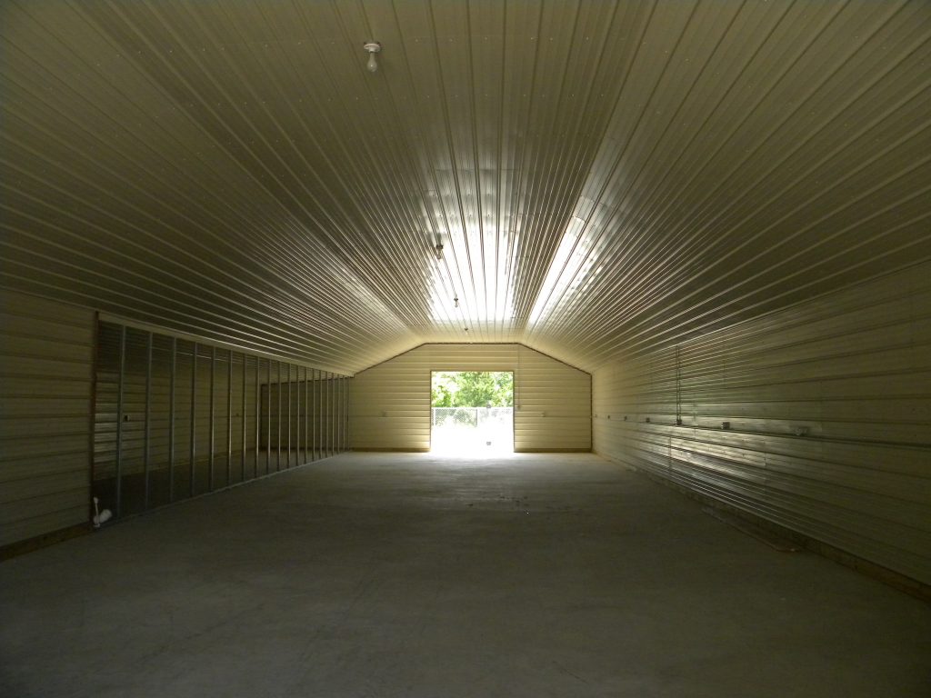 Eagle Carports 30x150x12 with leanto fully sheeted inside view - Eagle ...