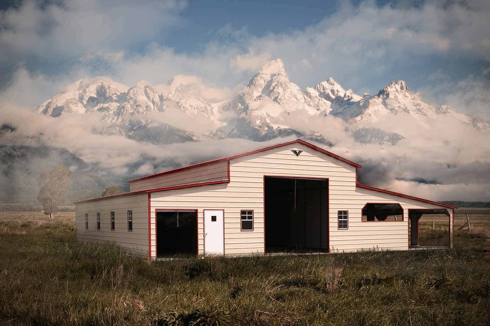 Custom-Horse-Barn-with-Stalls-Mountain-Background - Eagle Carports
